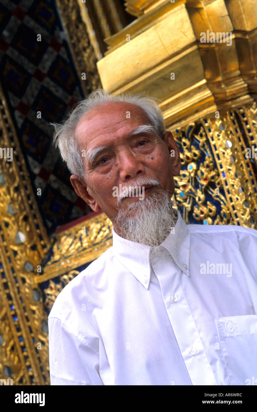 Local man with gold at Emerald Palace in Grand Palace in Bangkok ...