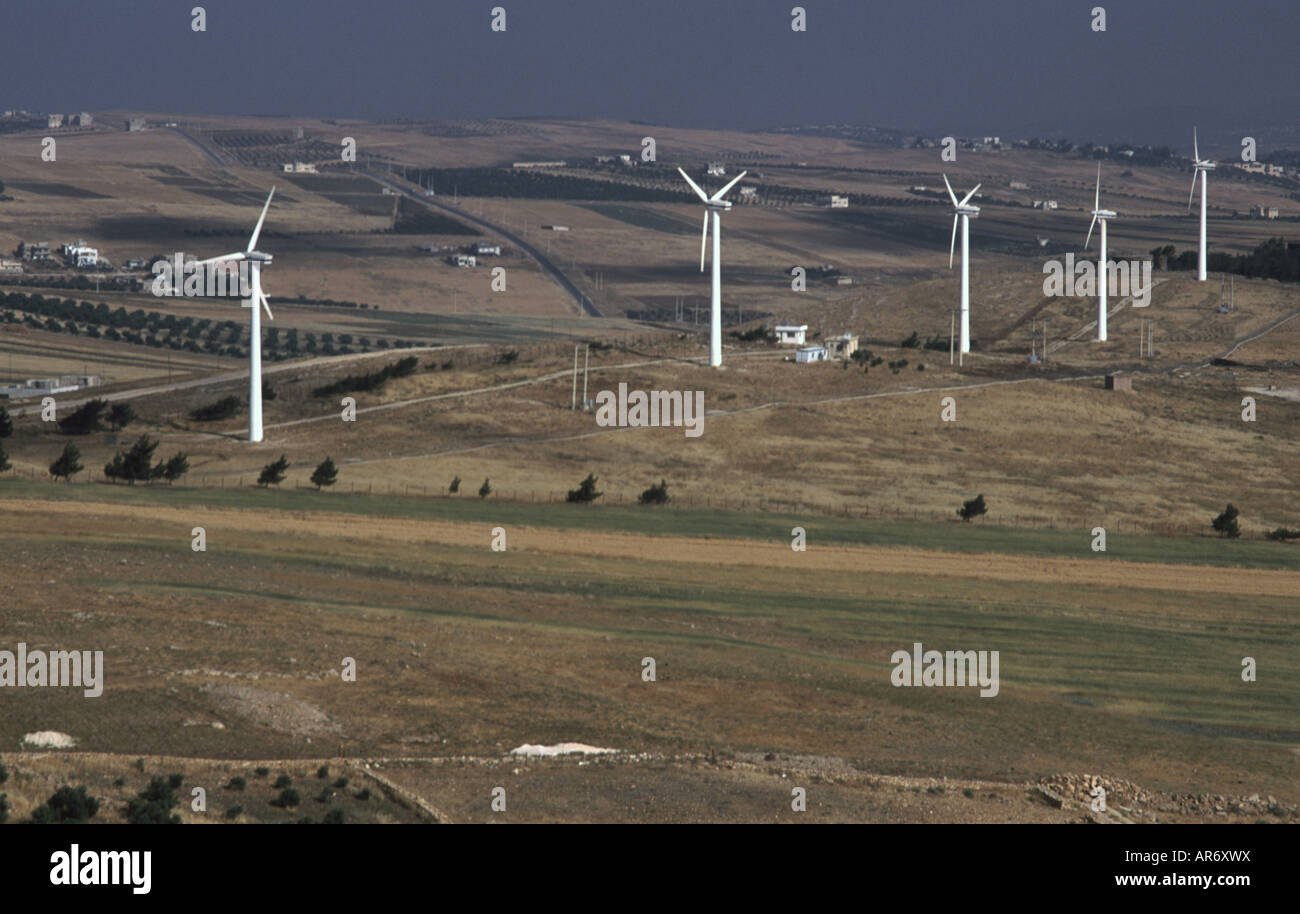 Renewable energy windmills harvesting electricity on hillside in Jordan ...