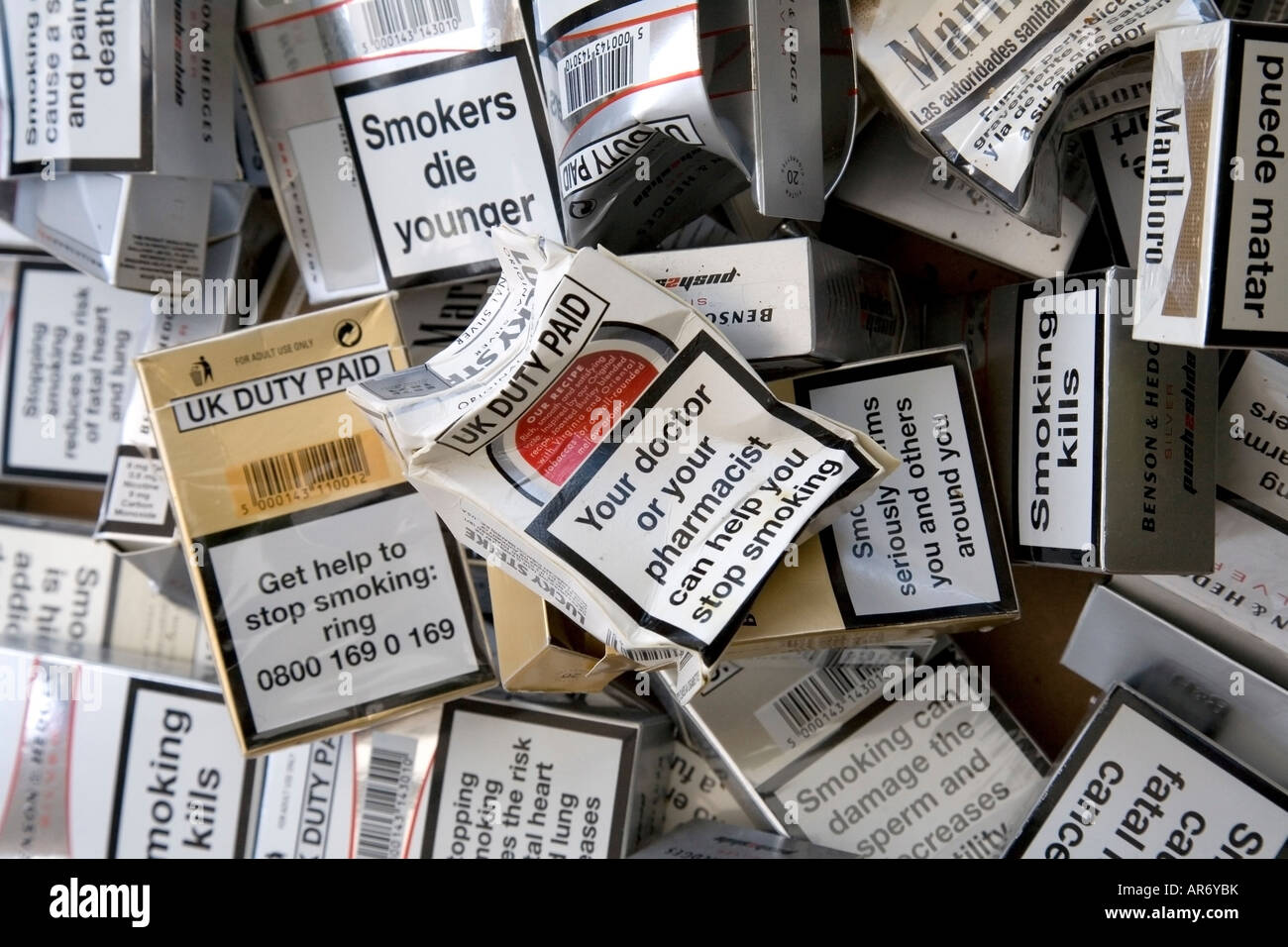 DISCARDED CIGARETTE PACKETS WITH WARNINGS ON THEM Stock Photo - Alamy
