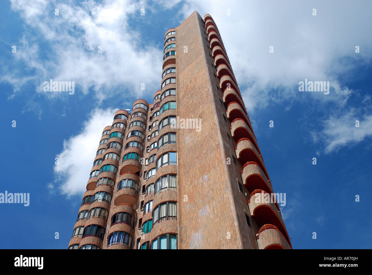 Red high rise building in Benidorm, Spain Stock Photo - Alamy