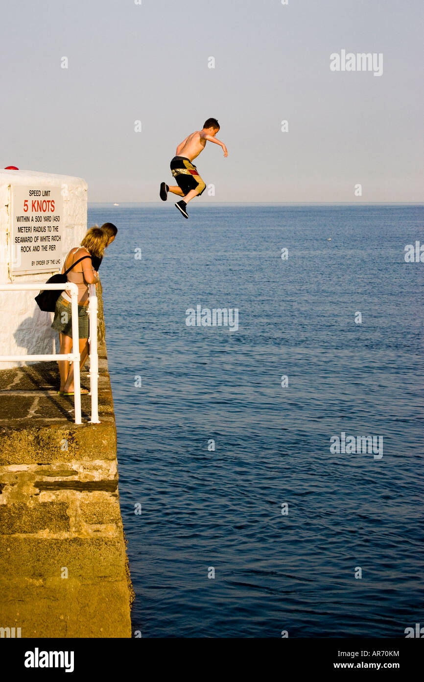Child jumping off wall hi-res stock photography and images - Alamy
