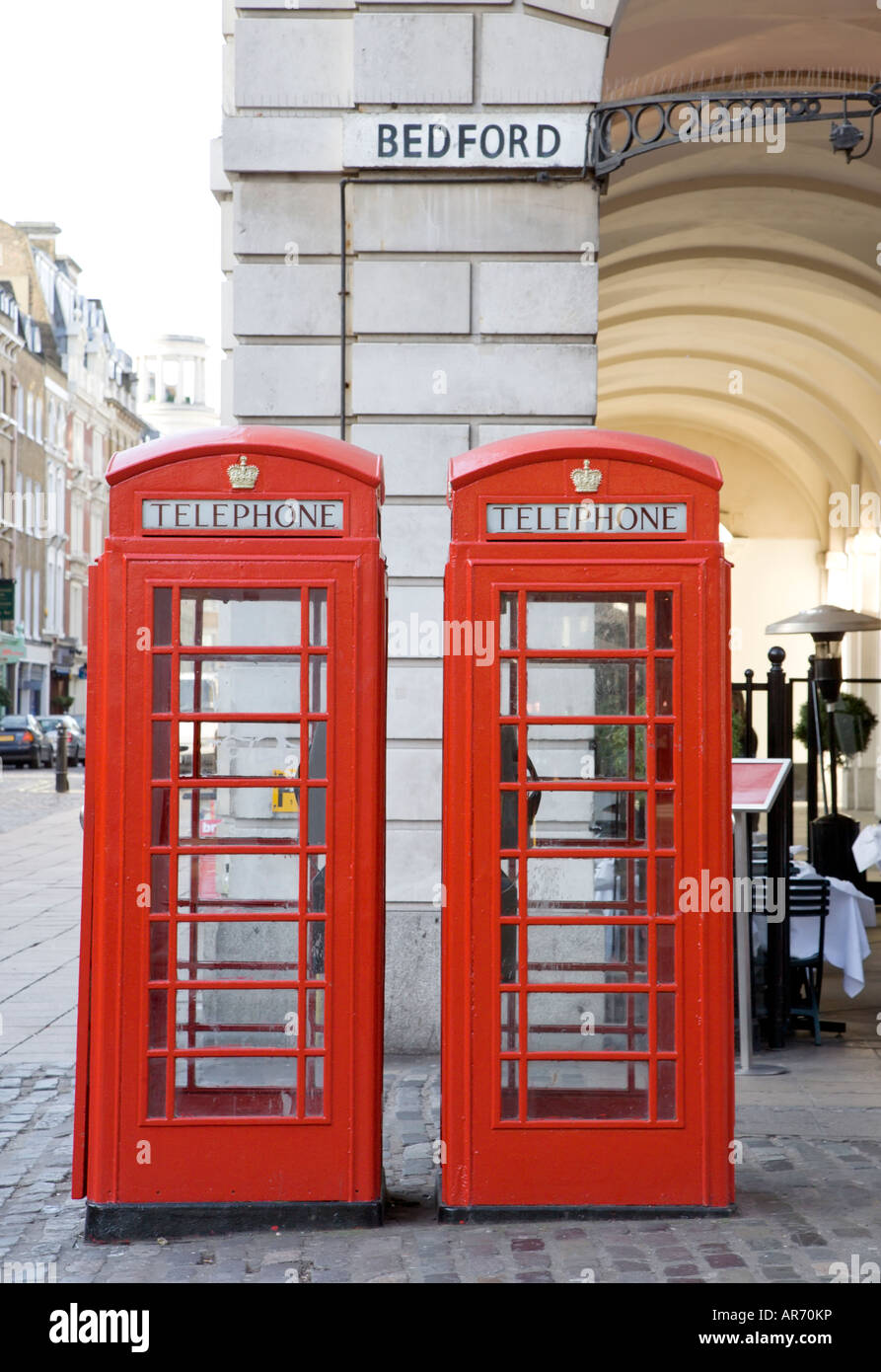 Pair of red telephone boxes Stock Photo - Alamy