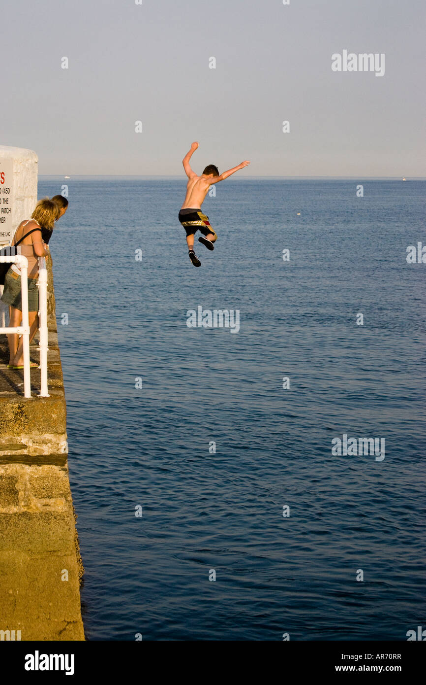 Child jumping off wall hi-res stock photography and images - Alamy