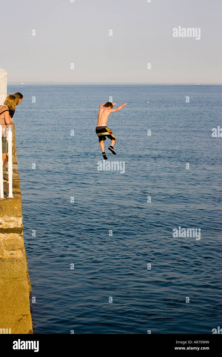 Child jumping off wall hi-res stock photography and images - Alamy