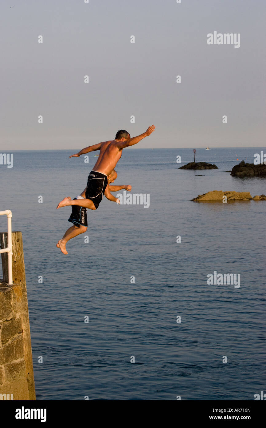 Child jumping off wall hi-res stock photography and images - Alamy