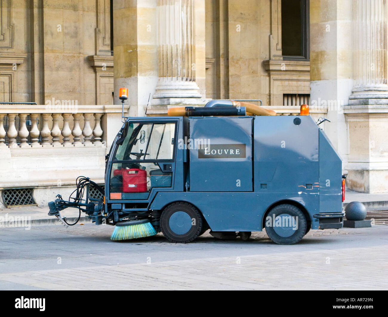 Small branded cleaning van in the courtyard of The Louvre Museum Paris ...