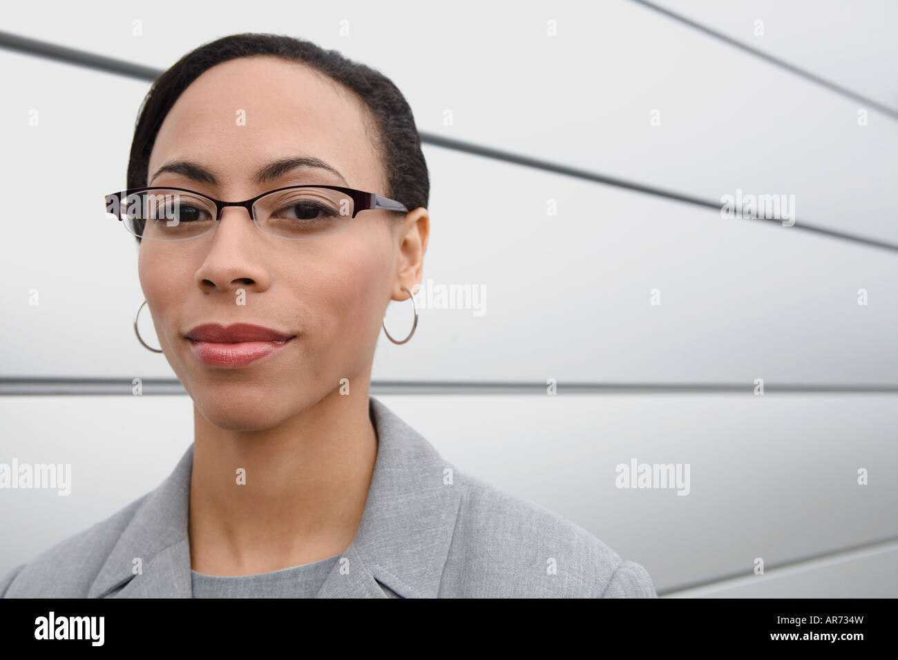 African businesswoman wearing eyeglasses Stock Photo - Alamy