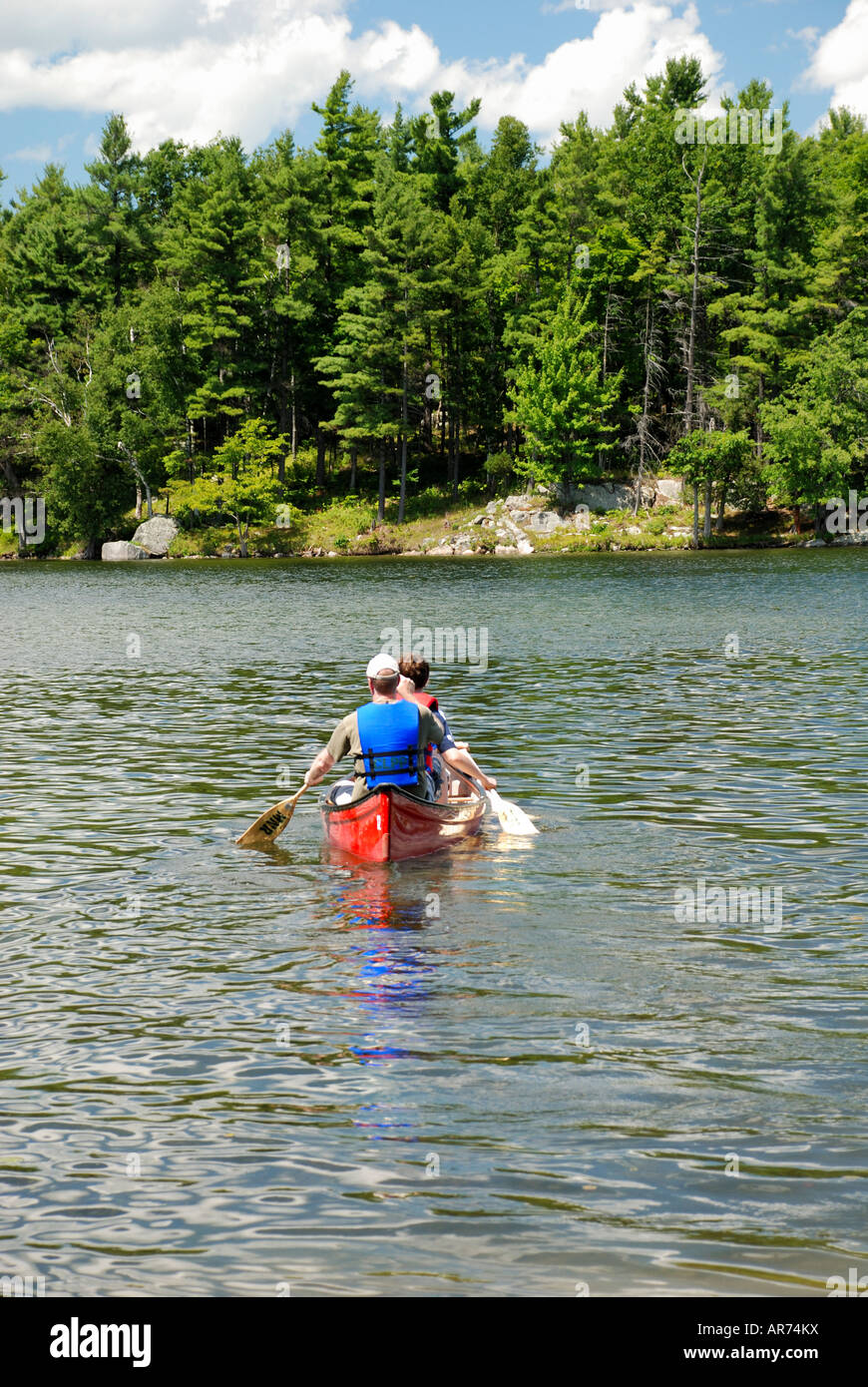 canoeing on lake in Canada Stock Photo - Alamy