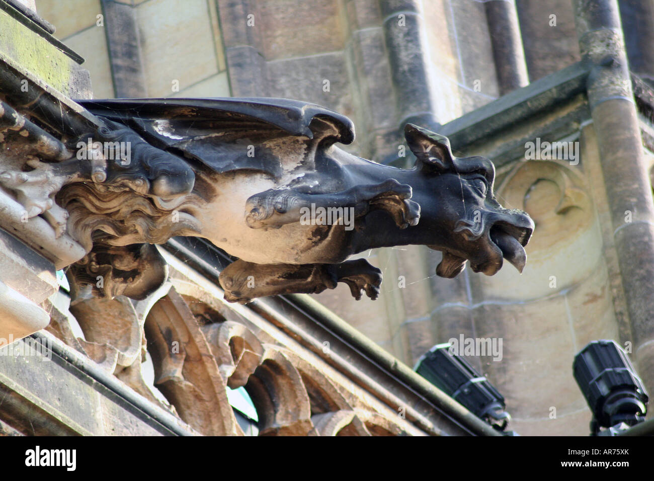 A gargoyle on prague castle Stock Photo - Alamy