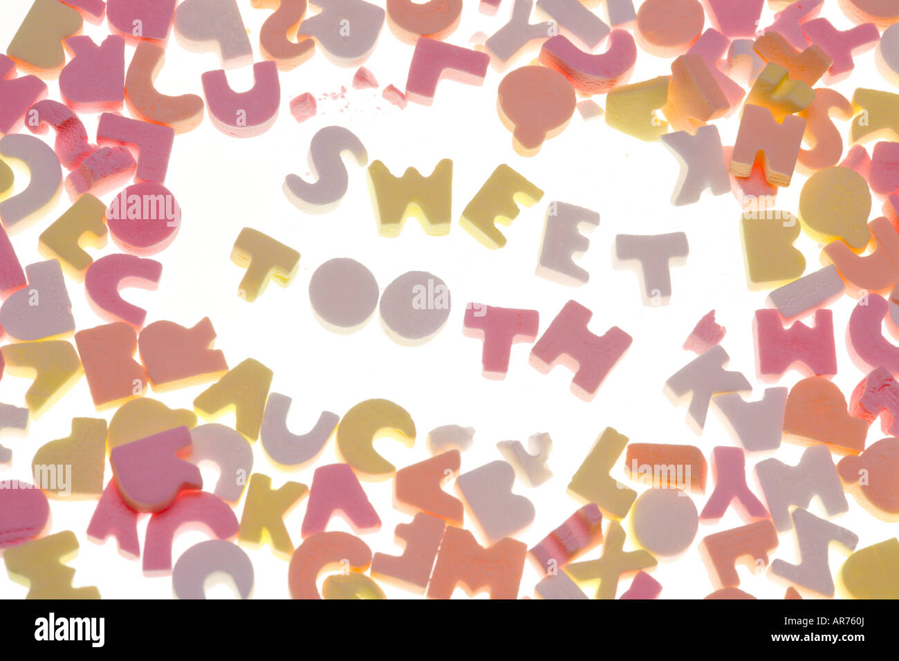 Sweet Tooth spelt out using ABC sweets Stock Photo - Alamy