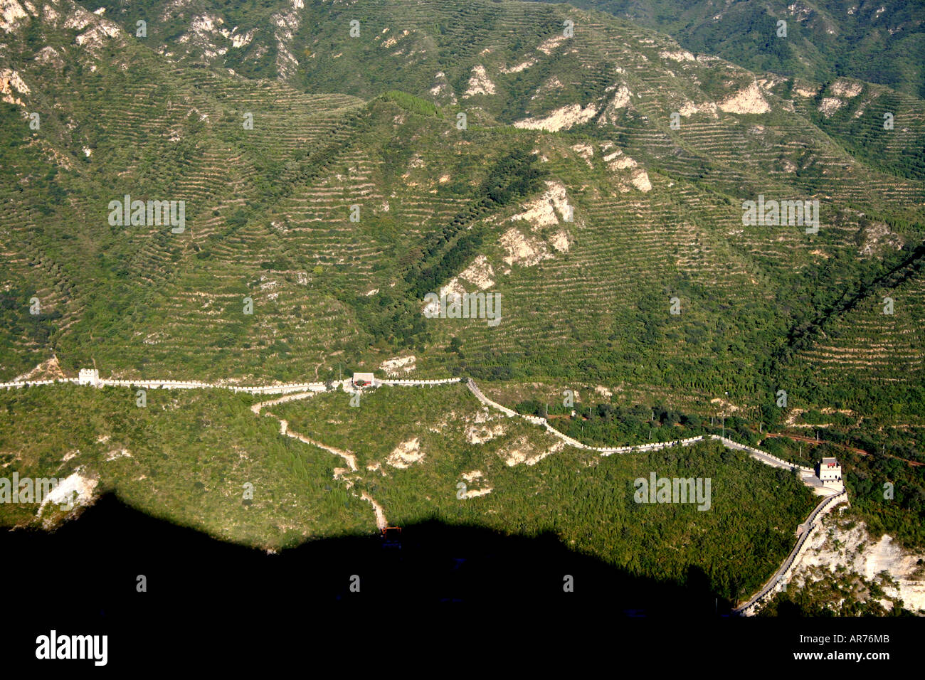 Great Wall of China. Shadow of lookout tower from higher wall seen on ...