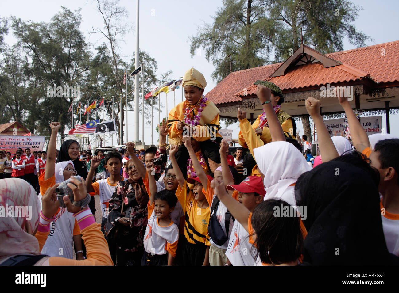 Celebrating a child hero in Kuala Terengganu, Malaysia Stock Photo - Alamy