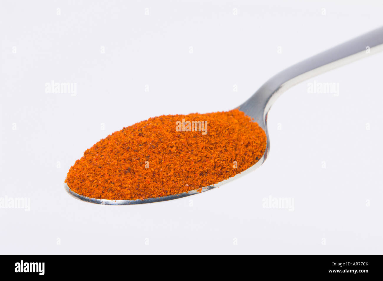 spoonful of cayenne pepper Stock Photo - Alamy