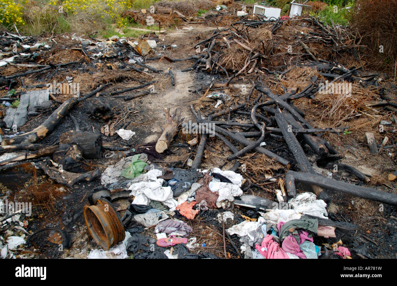 Garden waste and household rubbish dumped on waste ground near the city ...