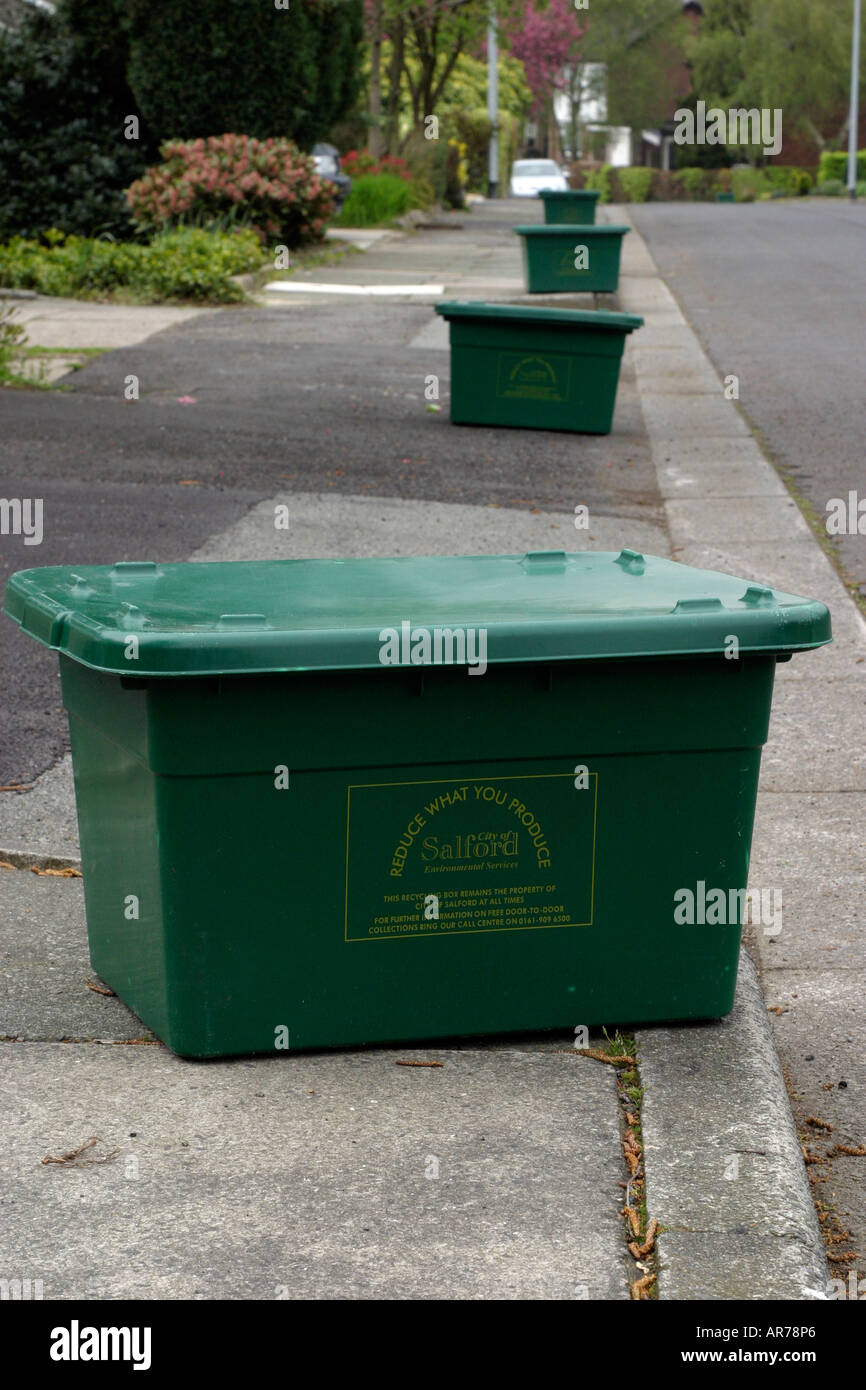 recycling containers on the pavement awaiting collection in England UK ...