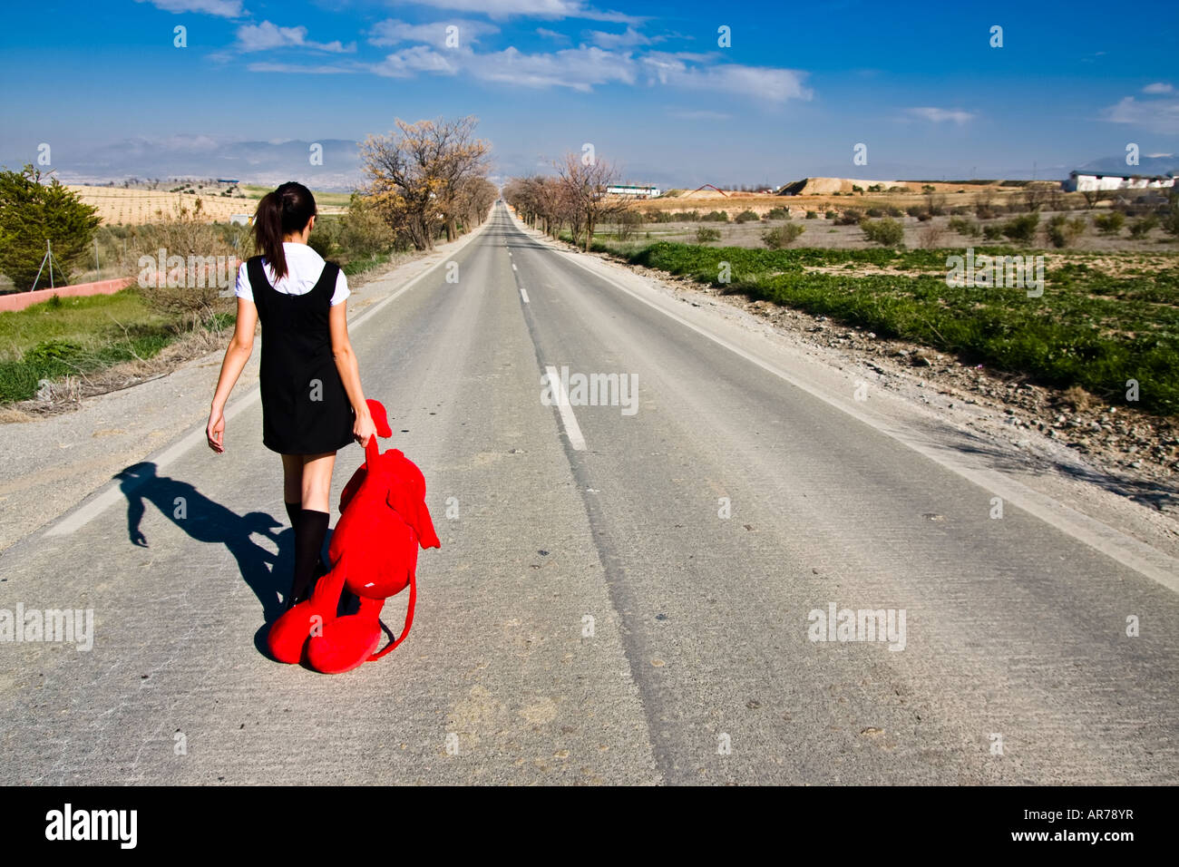 Young girl lefted behind with her teddy bear Stock Photo - Alamy