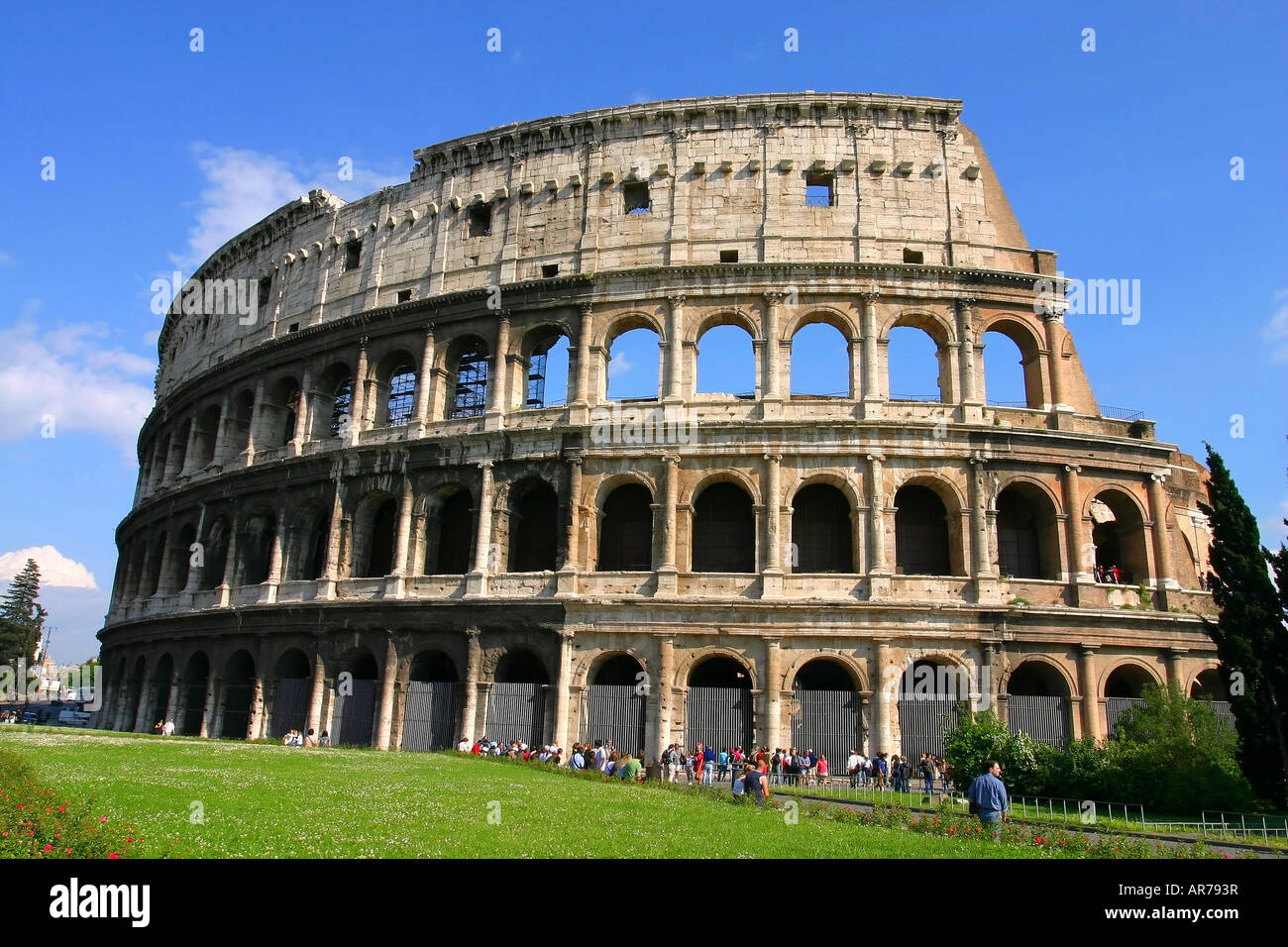Low Angle view of the Colosseum Amphitheater in Rome against blue sky ...