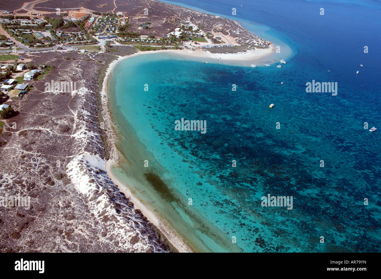 Aerial view of the township boats and reefs of Coral Bay Ningaloo Reef ...