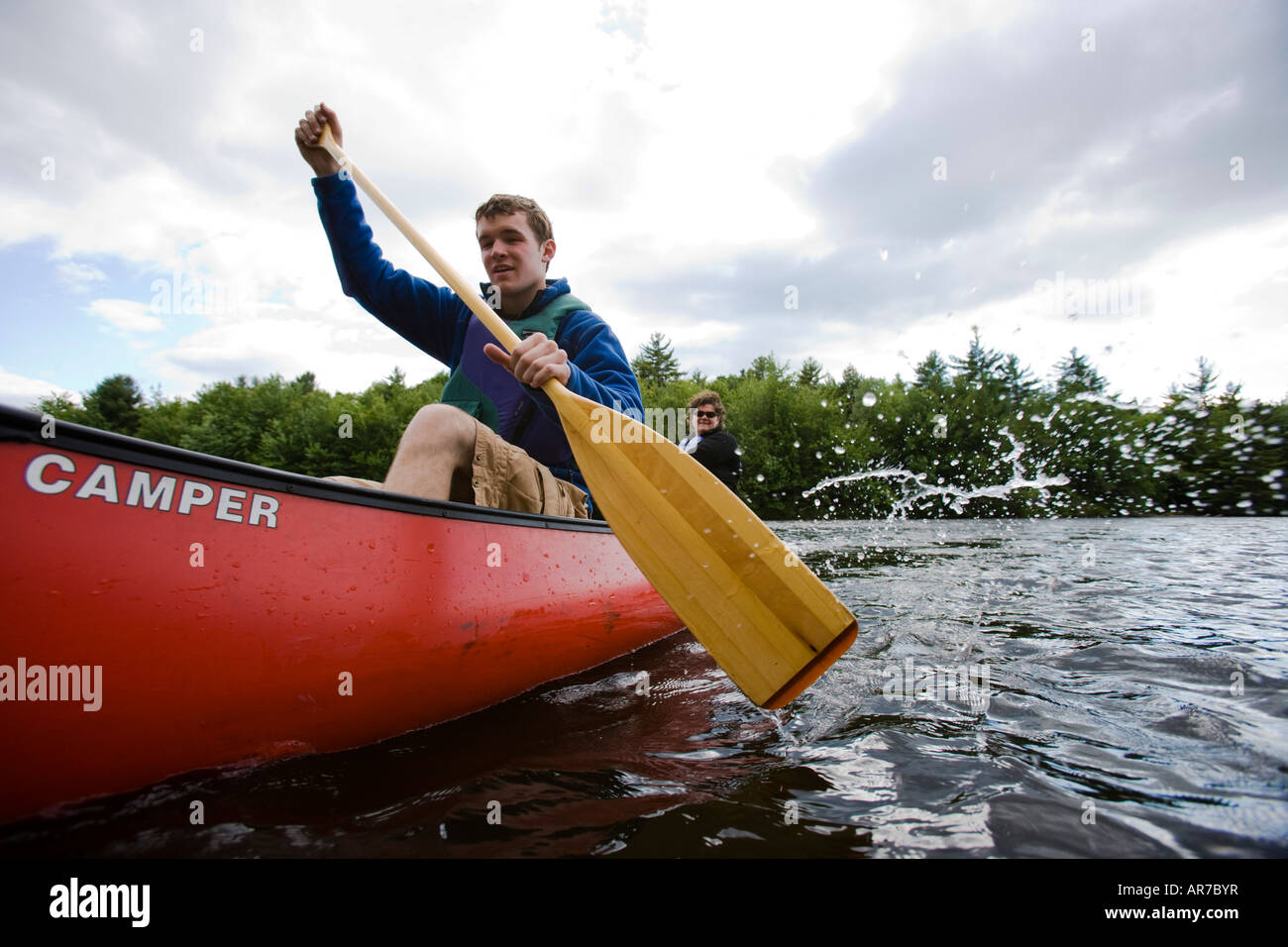 A couple canoes on the Androscoggin River in Turner, Maine Stock Photo ...