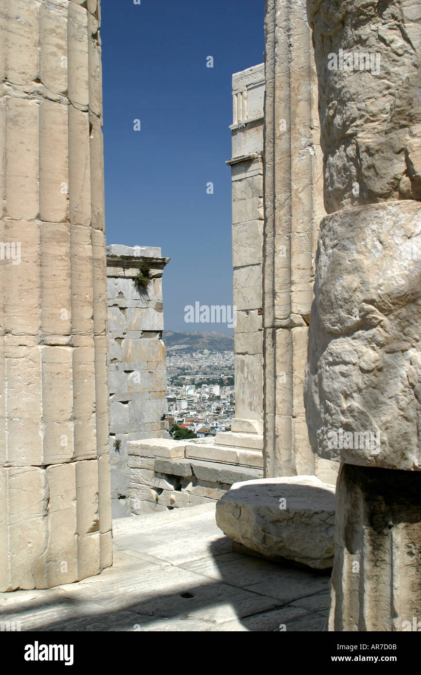 The ancient city of Athens viewed through the stone column ruins of the ...