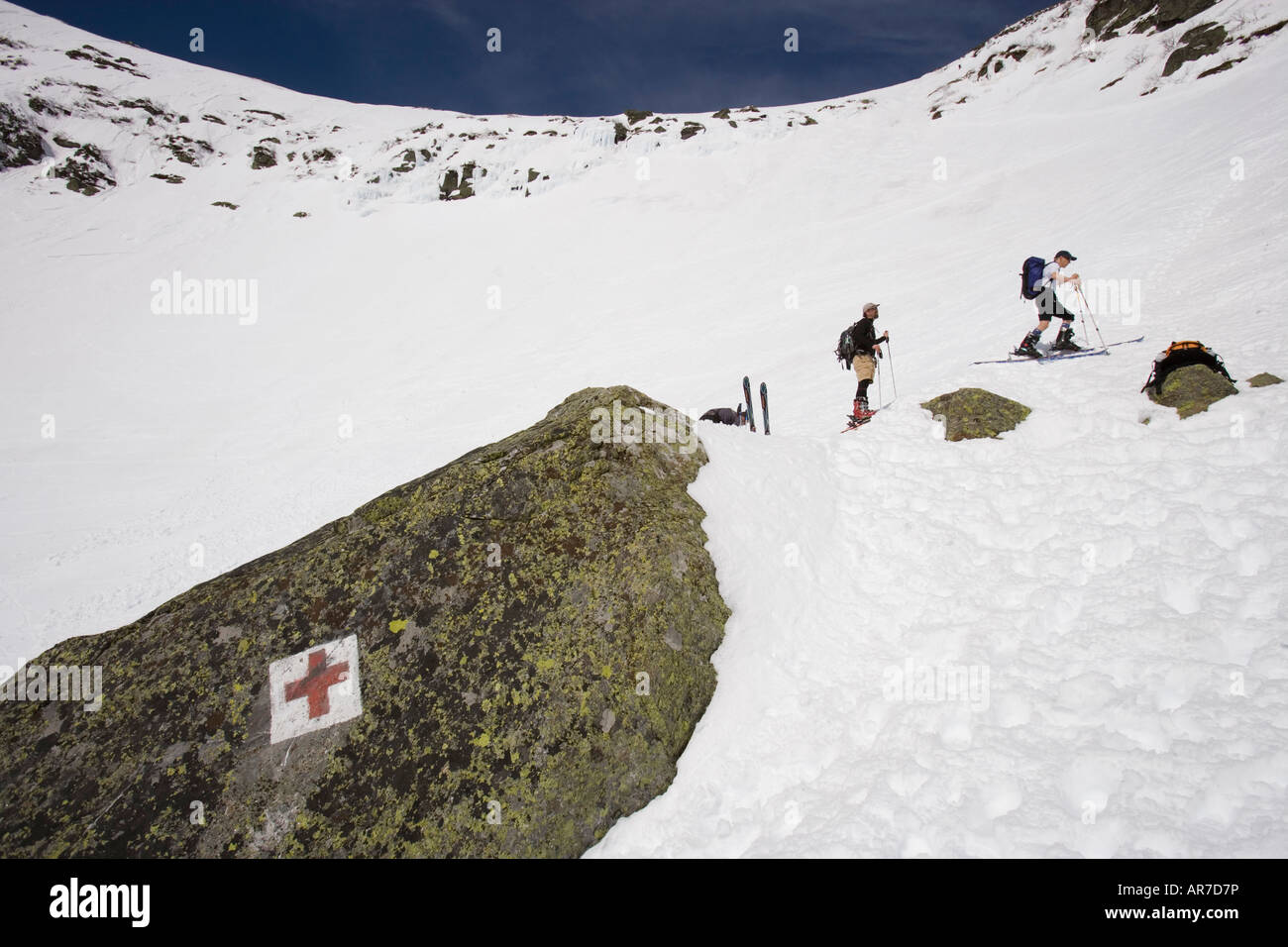 Skiers climbing Tuckerman Ravine in New Hampshire s White Mountains ...