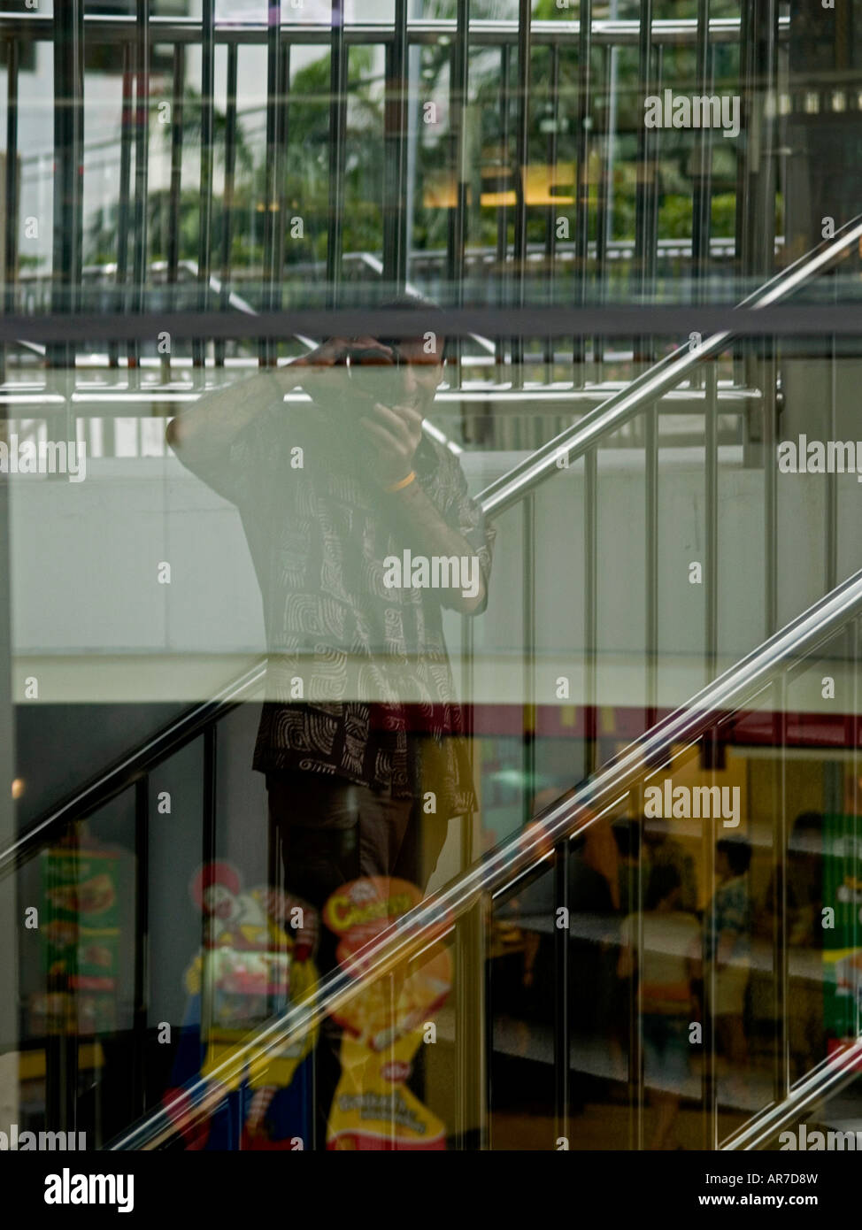 photographer reflected in shopping mall window Bangkok Stock Photo - Alamy