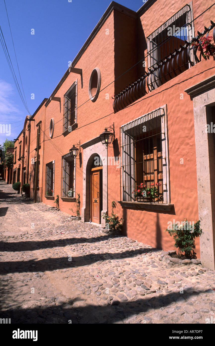 Beautiful colors of Mexico Architecture stucco with flowers and arches ...