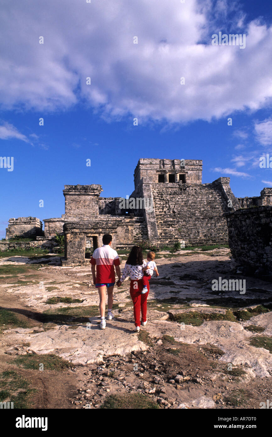 Tourists looking at famous Tulum ruins in historic Yucatan Mexico Stock ...