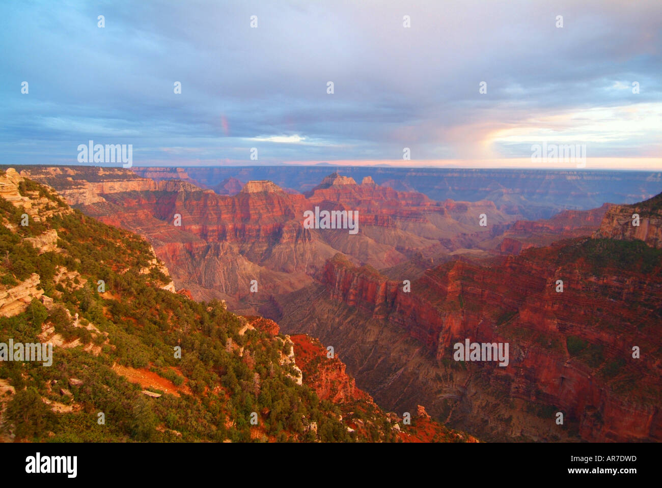 The setting Sun warms the canyon walls of Bright Angel Canyon Stock ...
