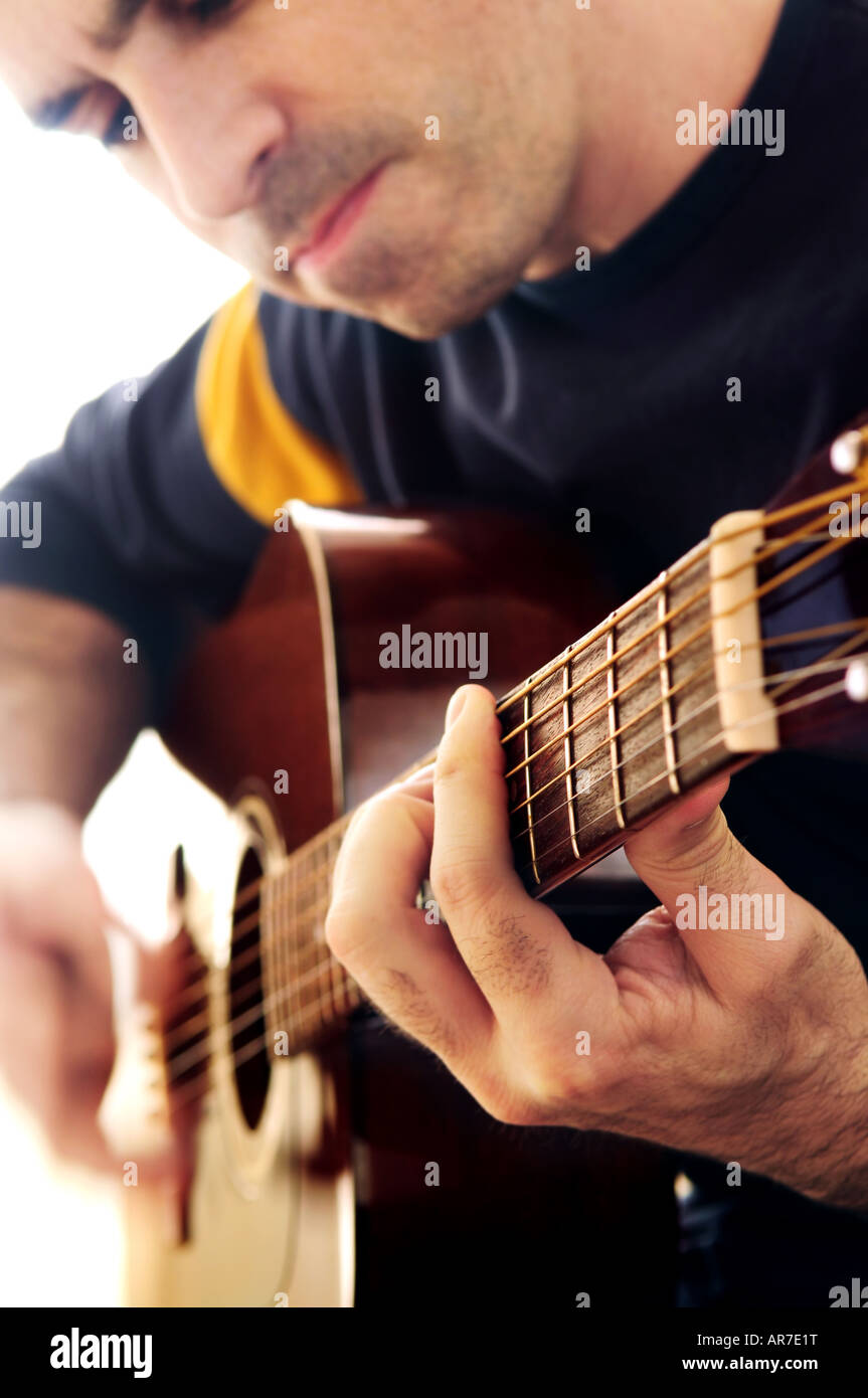 Hands holding music instruments guitar hi-res stock photography and ...