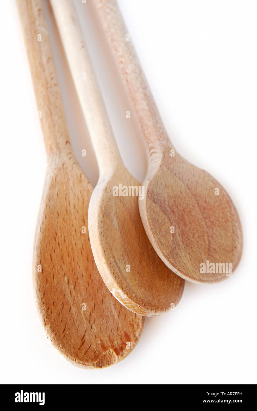Old wooden cooking spoons isolated on white background Stock Photo - Alamy