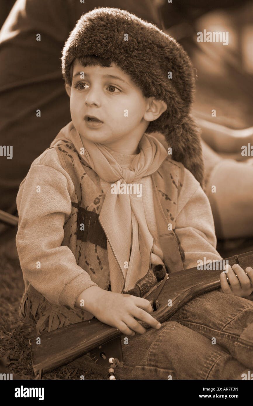 Boy with rifle hi-res stock photography and images - Alamy