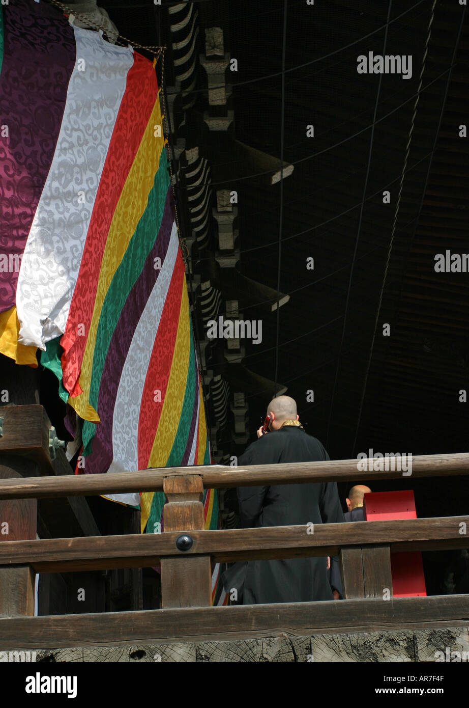 Mobile using monk hi-res stock photography and images - Alamy