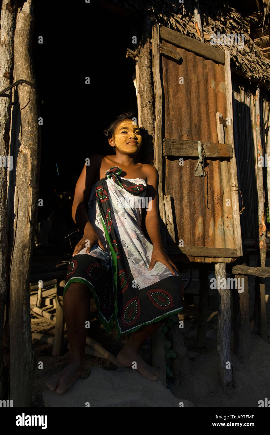 Girl with traditionally painted face from the Sakalava tribe, Nosy Be ...