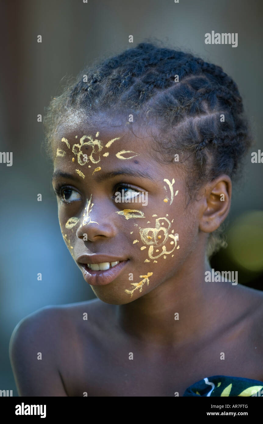 Girl with traditionally painted face from the Sakalava tribe, Nosy Be ...