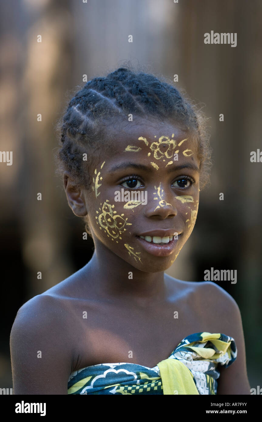 Girl with traditionally painted face from the Sakalava tribe, Nosy Be ...