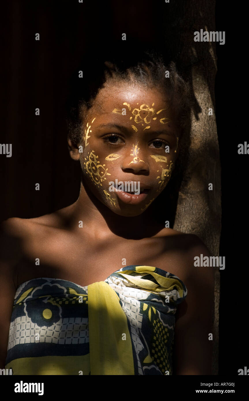 Girl with traditionally painted face from the Sakalava tribe, Nosy Be ...