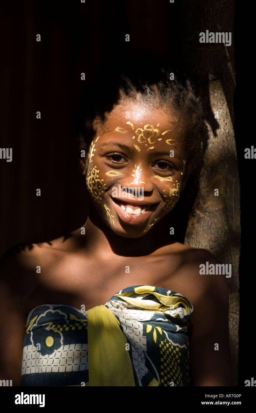 Girl with traditionally painted face from the Sakalava tribe, Nosy Be ...