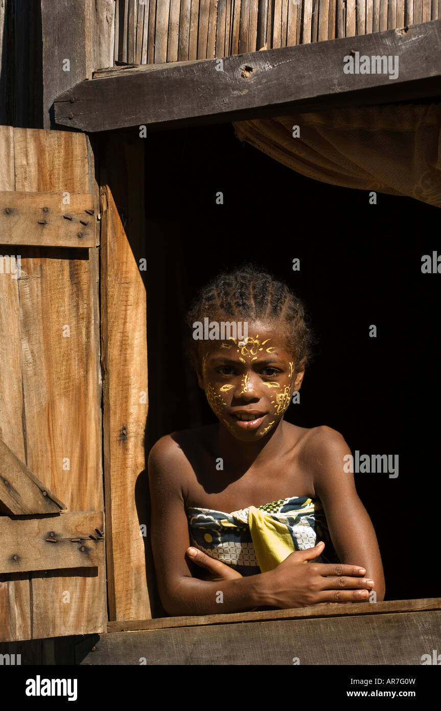 Girl with traditionally painted face from the Sakalava tribe looking ...