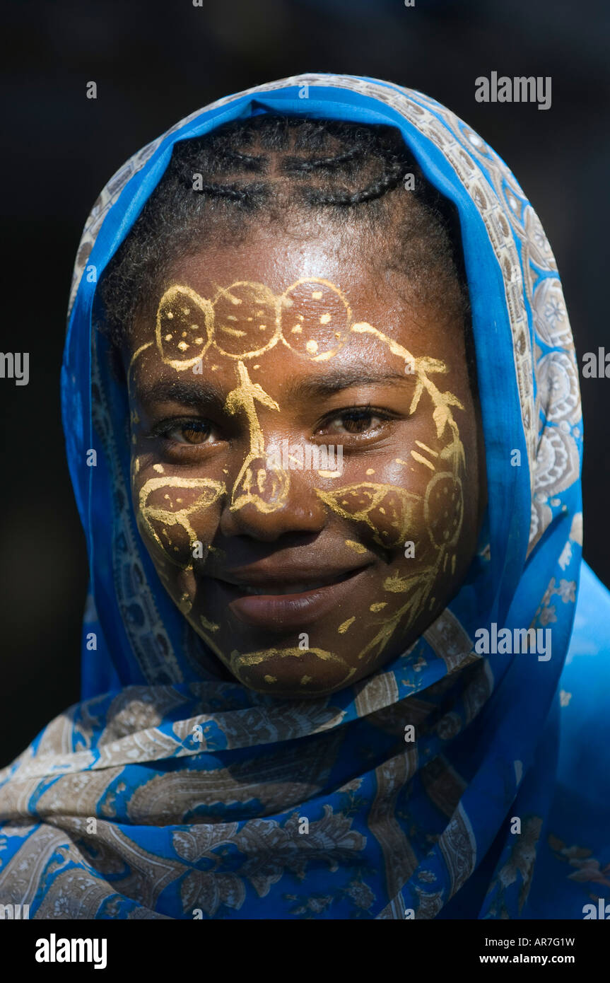 Girl with traditionally painted face from the Sakalava tribe, Nosy Be ...