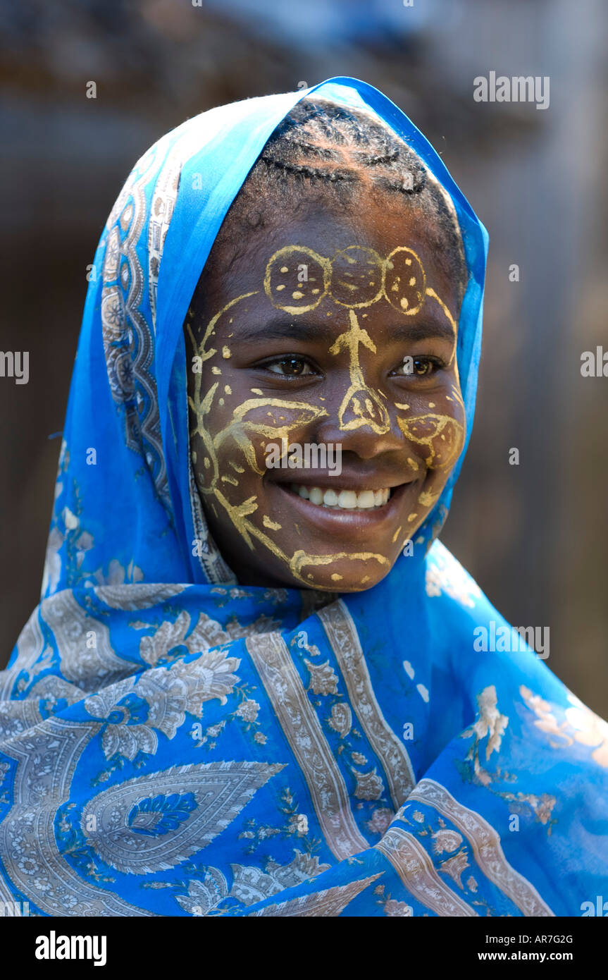 Girl with traditionally painted face from the Sakalava tribe, Nosy Be ...