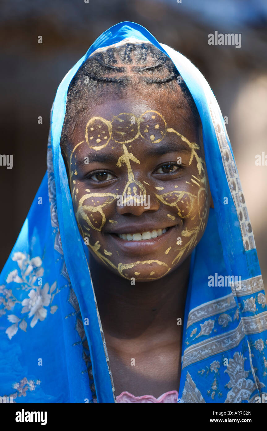 Girl with traditionally painted face from the Sakalava tribe, Nosy Be ...