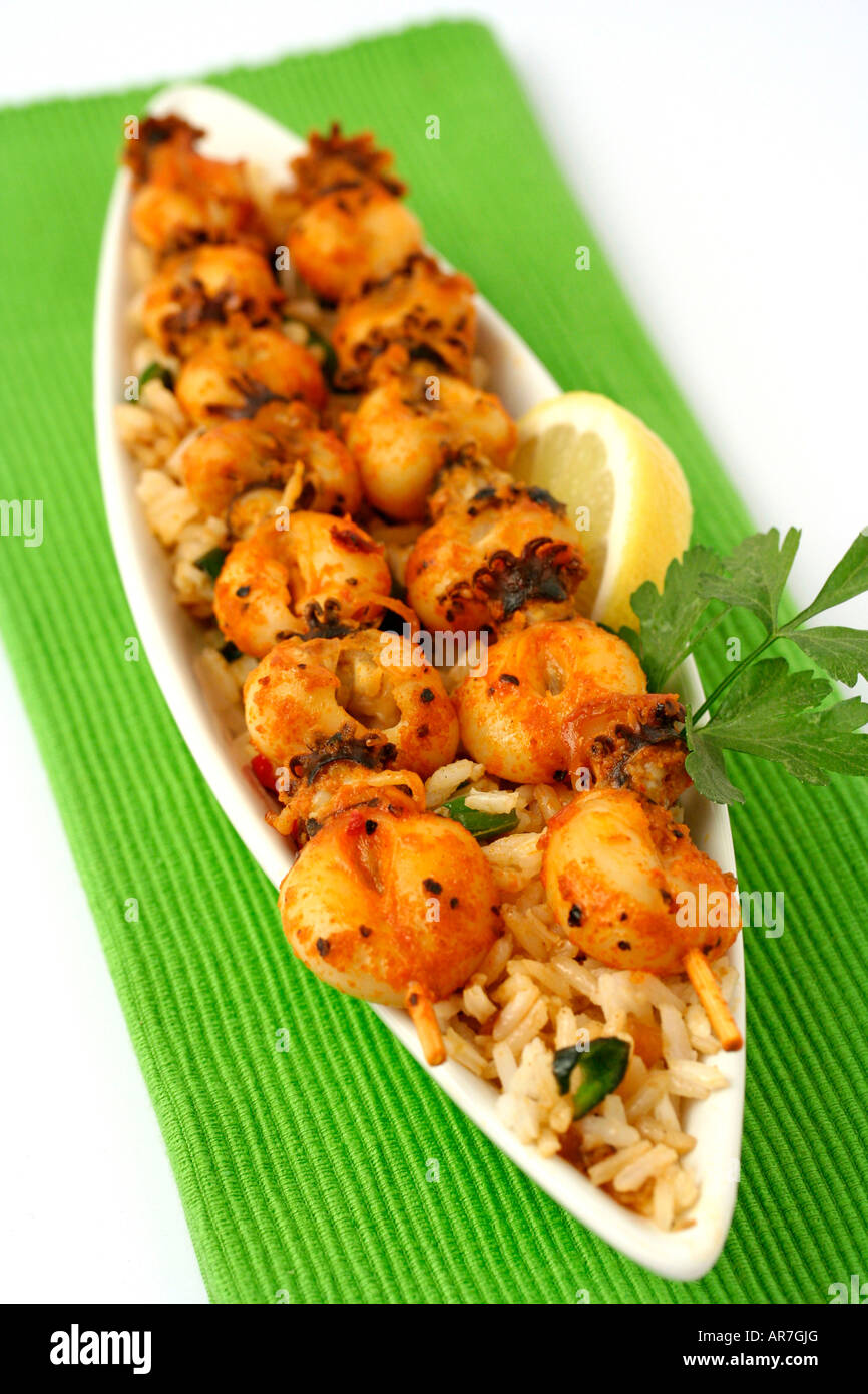 Squid skewers Recipe available Stock Photo - Alamy