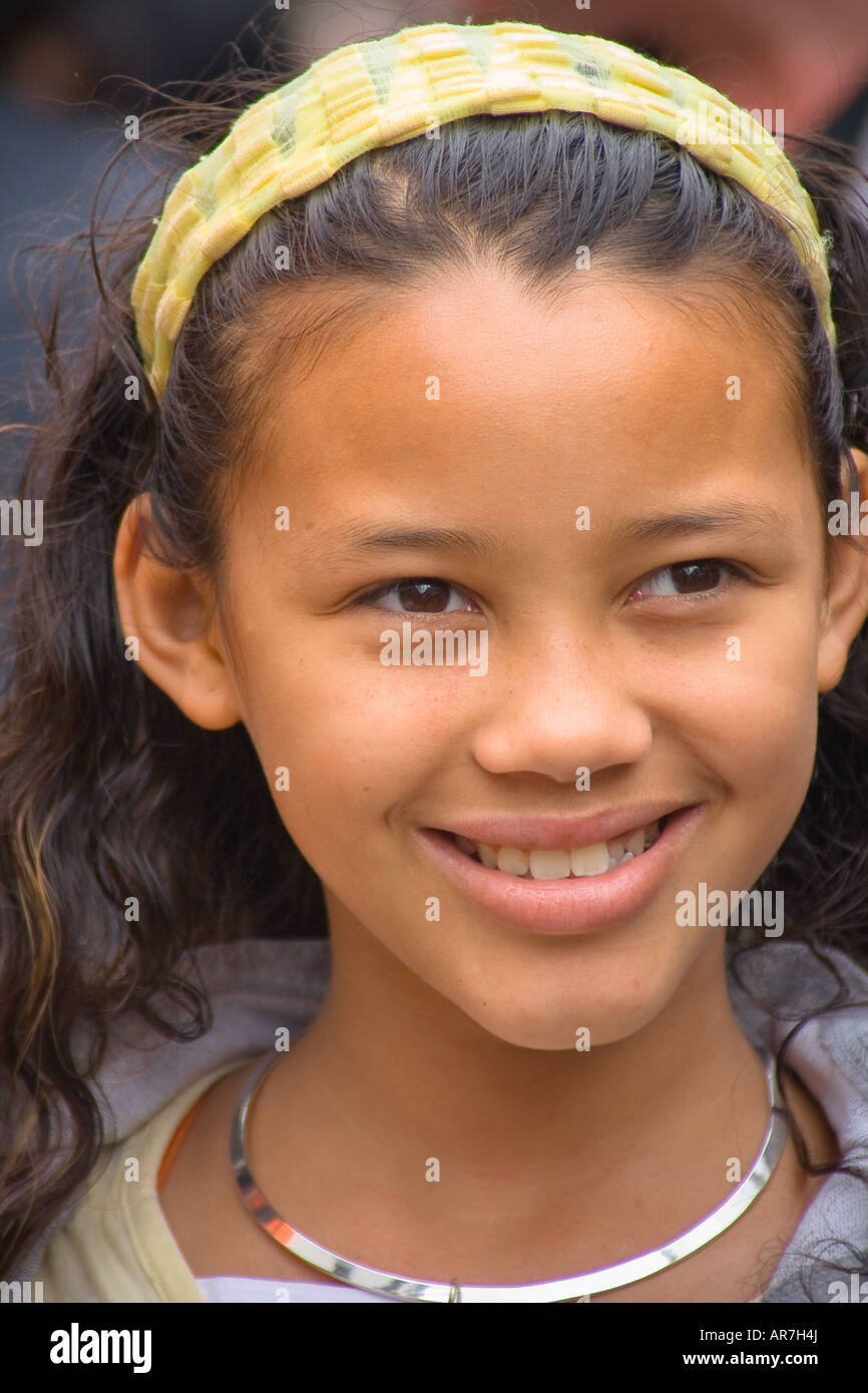 Pretty Girl with grin on his face outdoors in the public Stock Photo ...