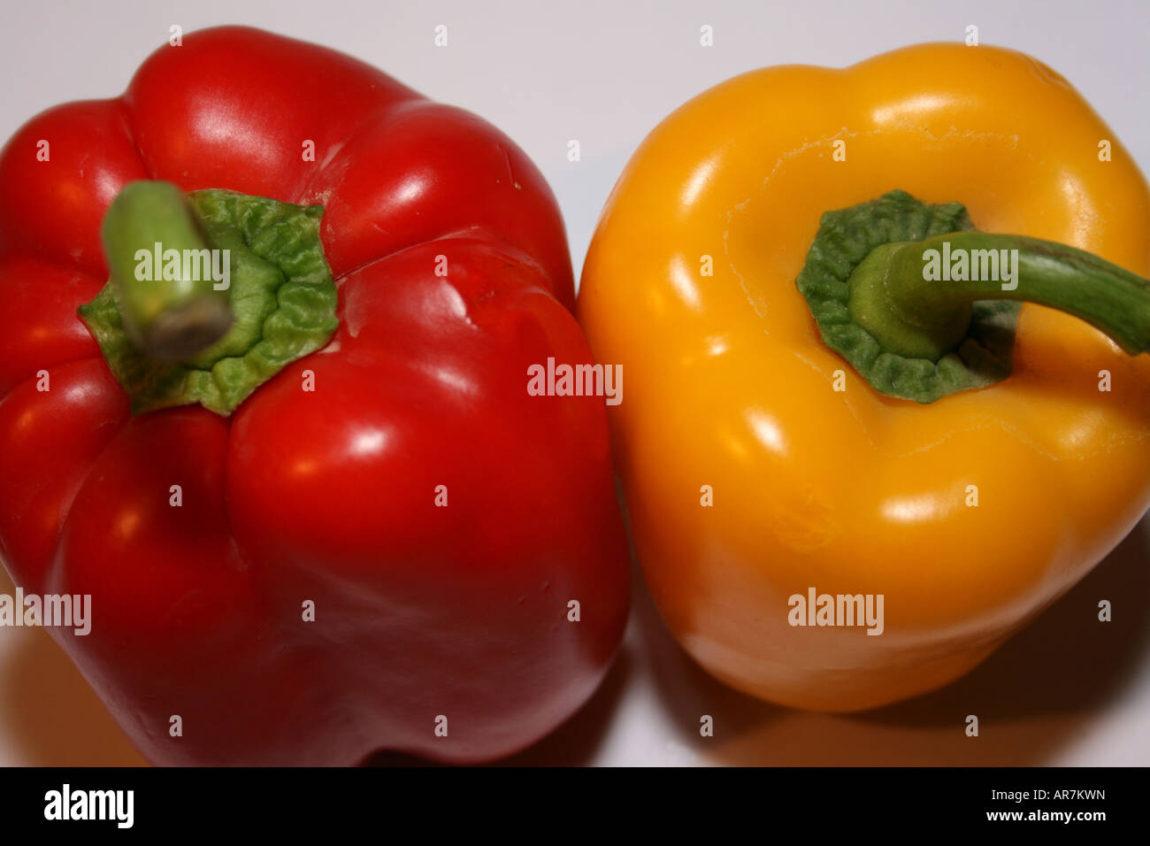 A red and yellow pepper Stock Photo - Alamy