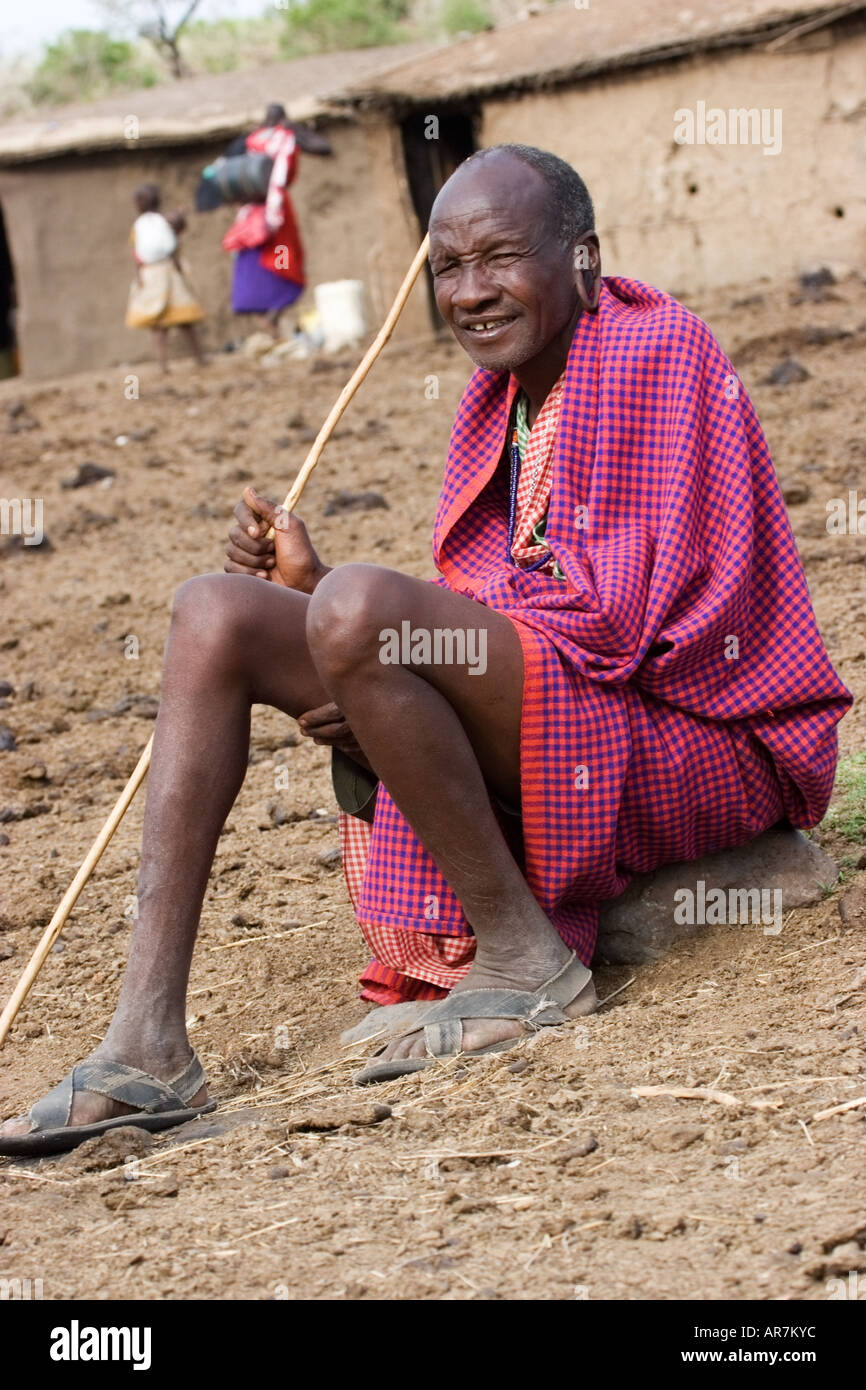 Portrait of Maasai man wearing trraditional cloak and decorations ...