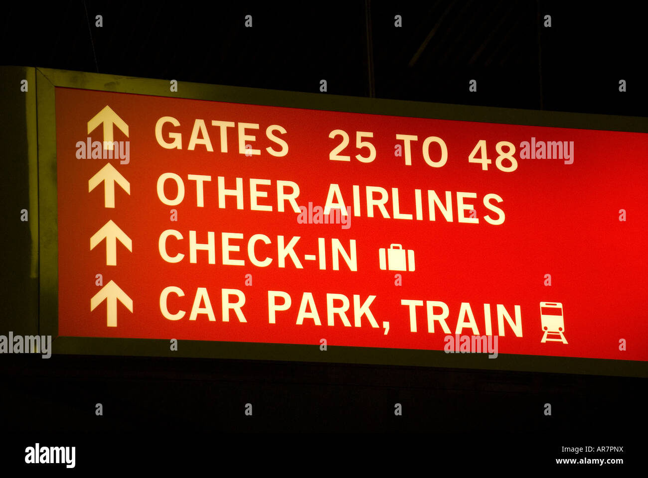 Arrival at airport sign with symbols for train hi-res stock photography ...