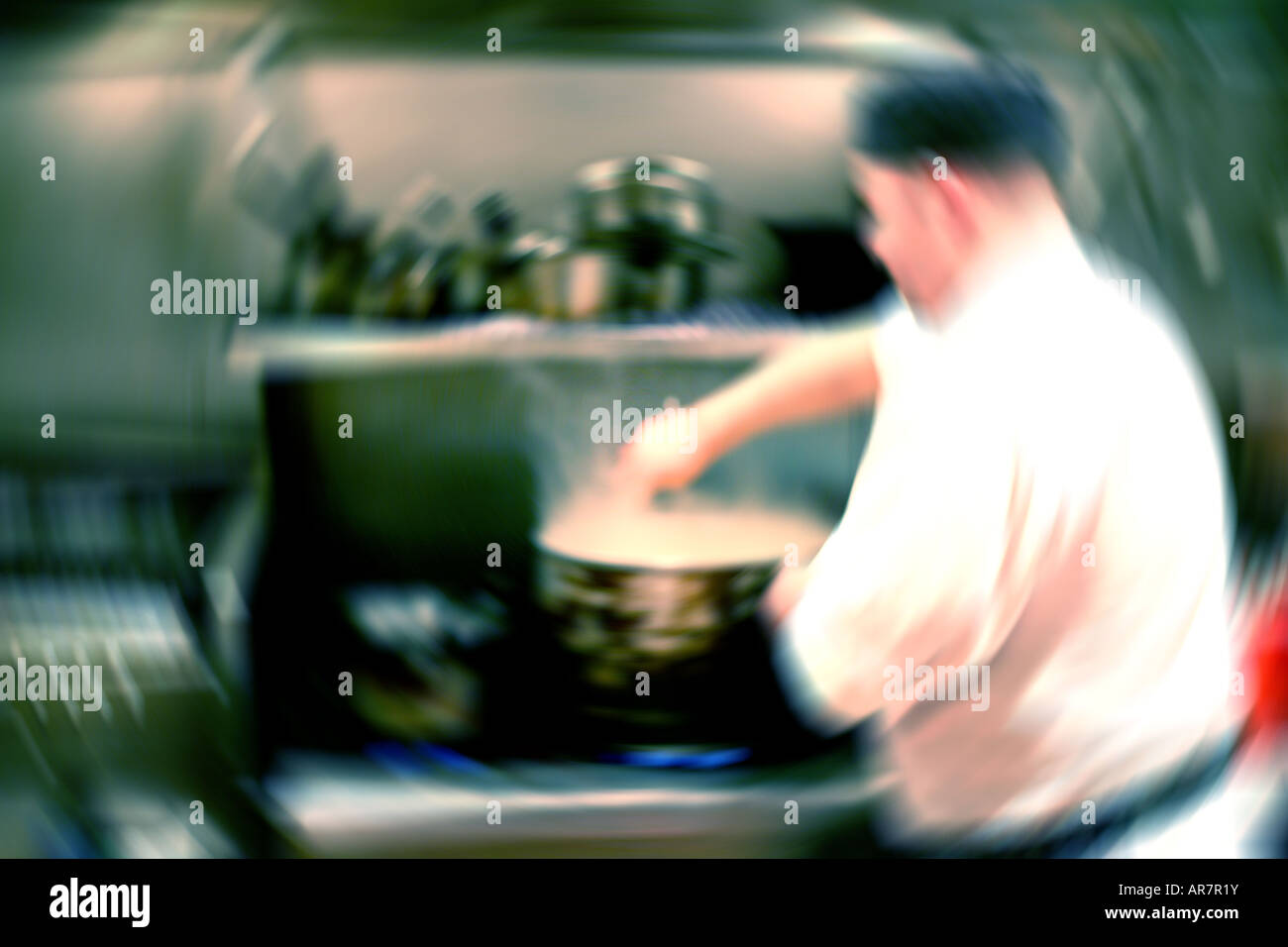 Chef working in restaurant kitchen Stock Photo - Alamy