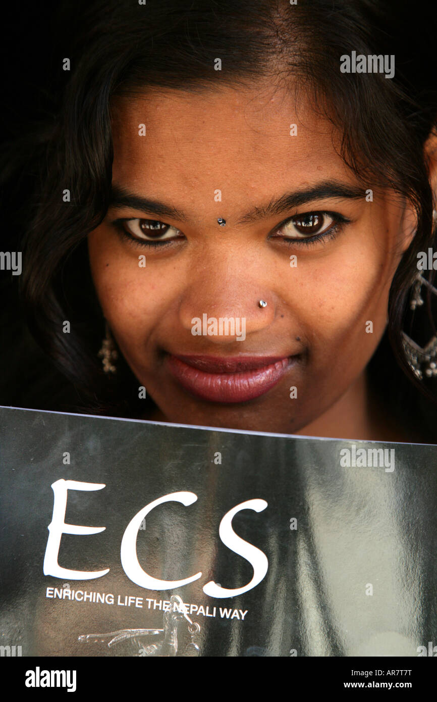 "Model reading ECS magazine Nepal Stock Photo - Alamy