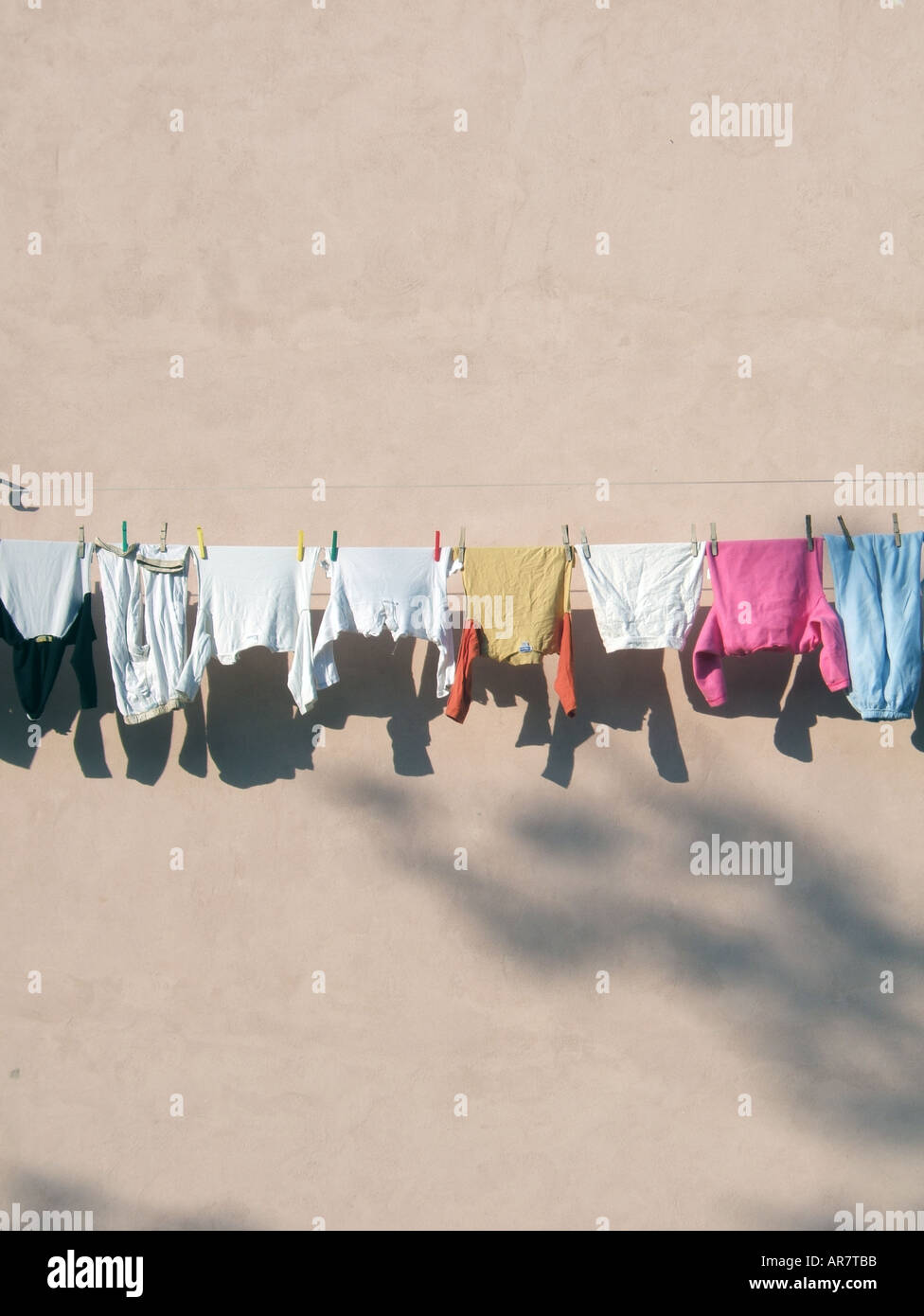 wet washing hanging on line Stock Photo - Alamy